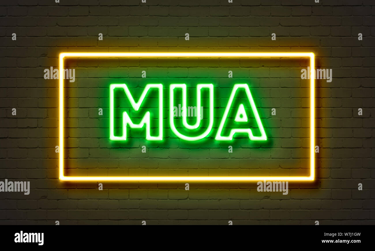 MUA neon sign on brick wall background Stock Photo - Alamy