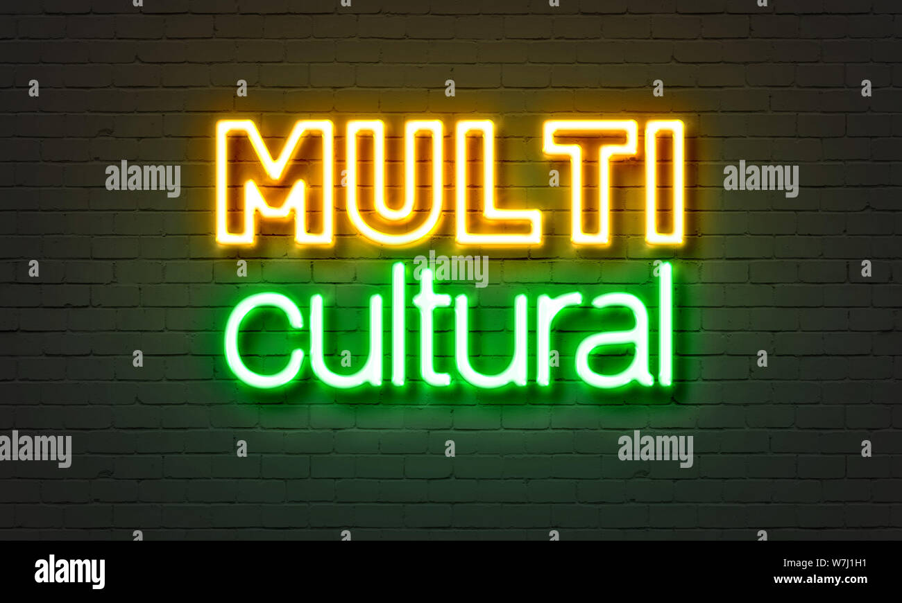 Multi cultural neon sign on brick wall background Stock Photo - Alamy