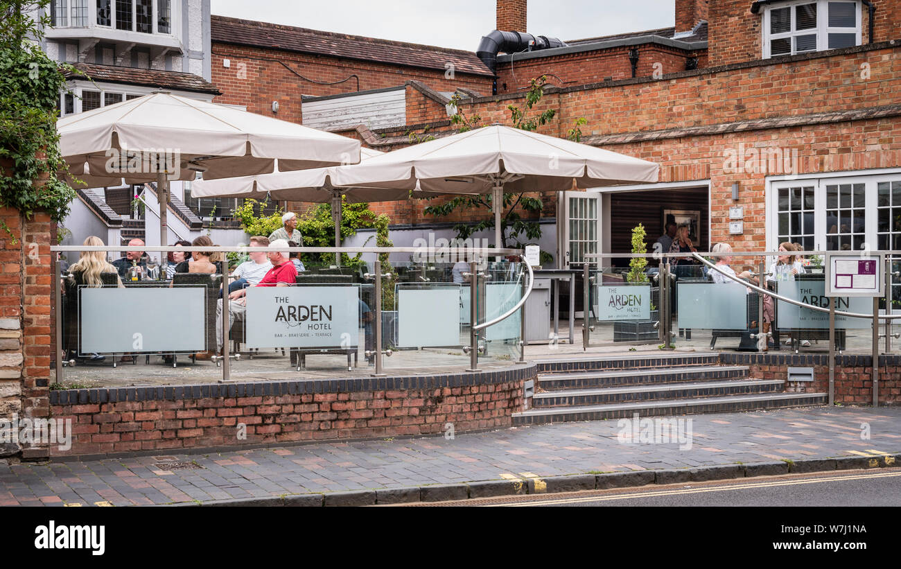 Cafes and restaurants. An exterior view of The Arden Hotel terrace with ...