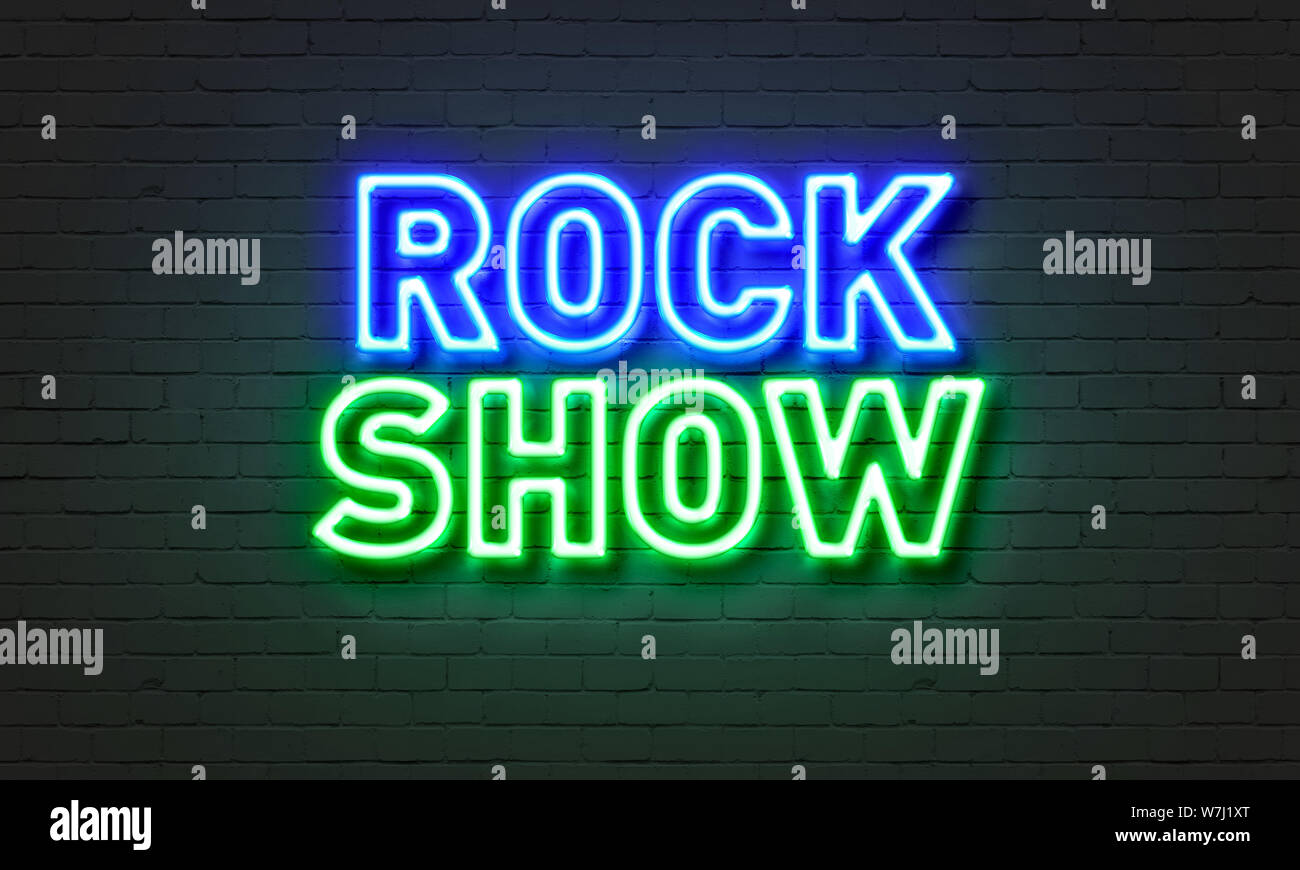 Rock show neon sign on brick wall background Stock Photo - Alamy