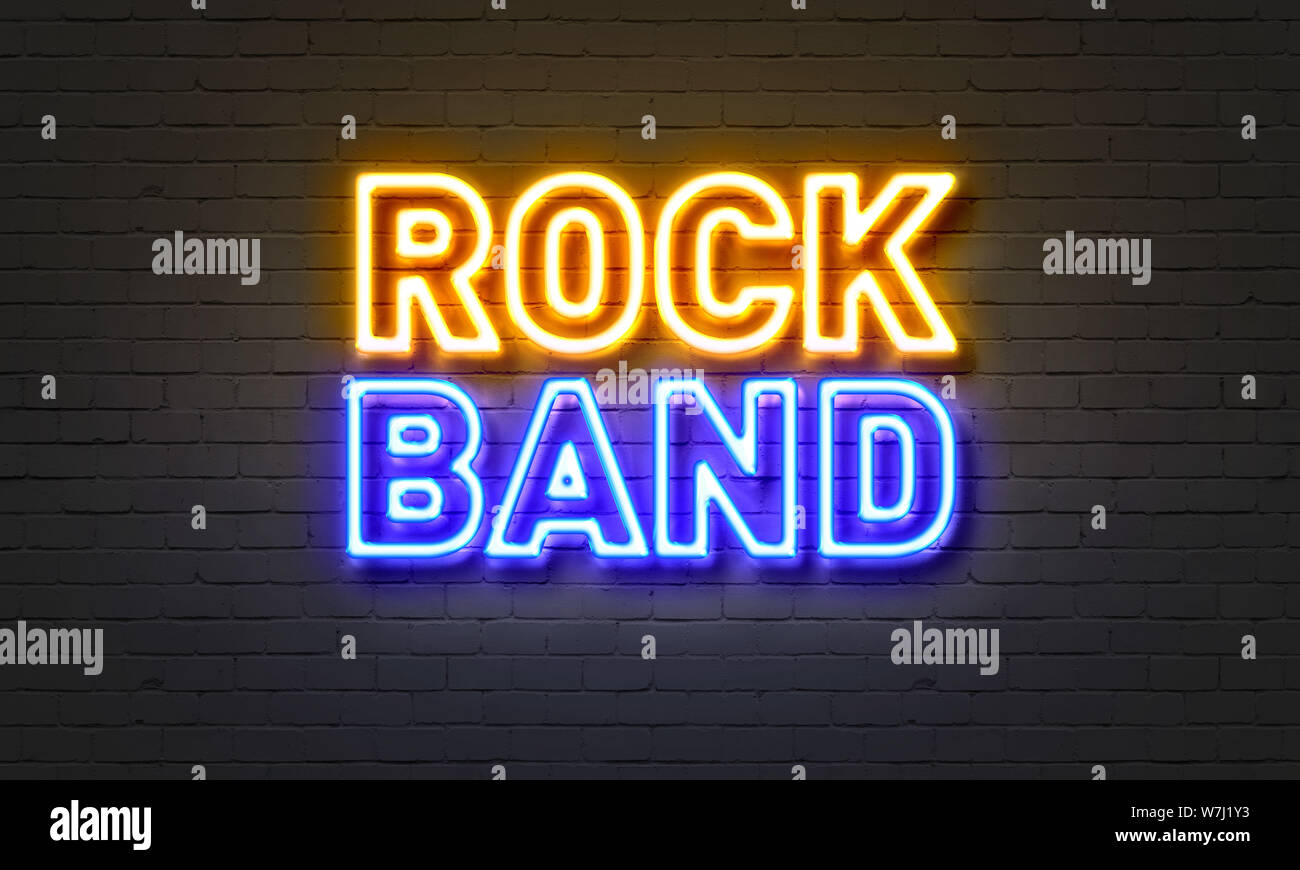 Rock band neon sign on brick wall background Stock Photo - Alamy