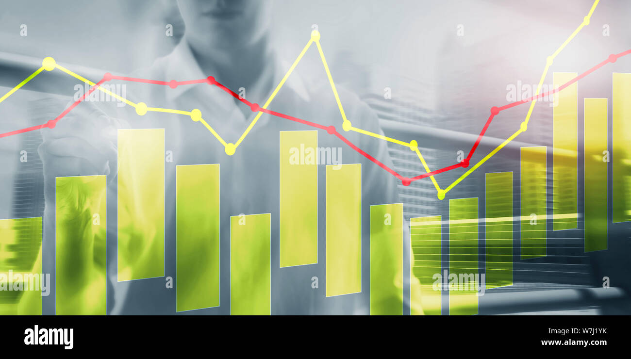 Yellow and red candles and charts on business technology background ...