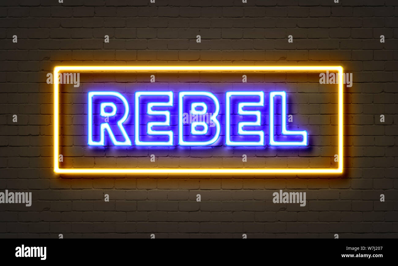 Rebel neon sign on brick wall background Stock Photo - Alamy