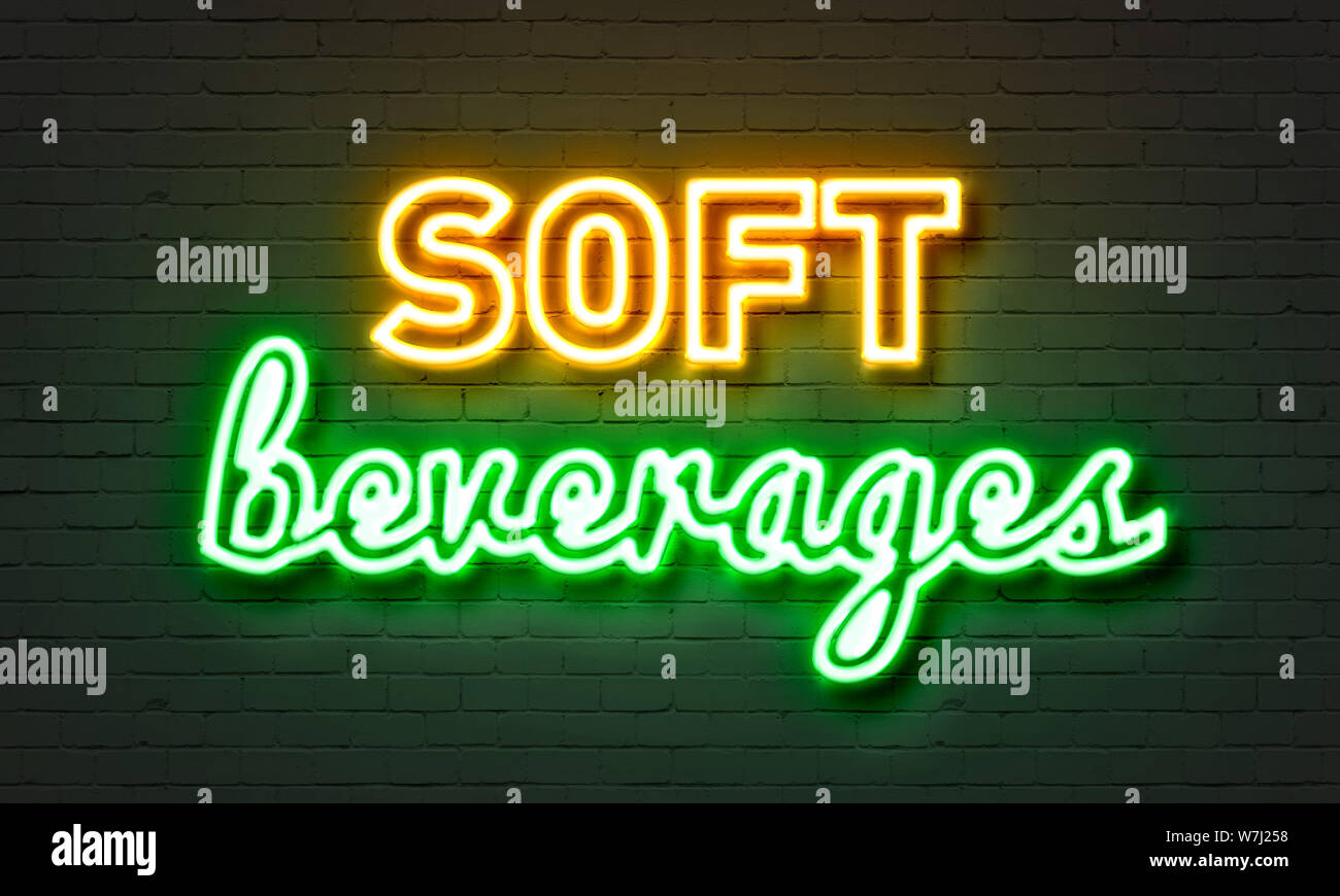 Soft beverages neon sign on brick wall background Stock Photo - Alamy