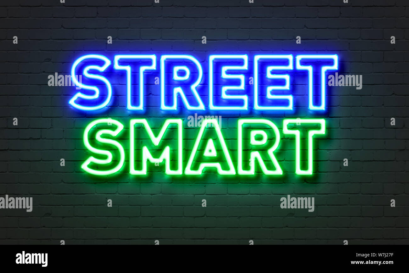Street smart neon sign on brick wall background Stock Photo - Alamy
