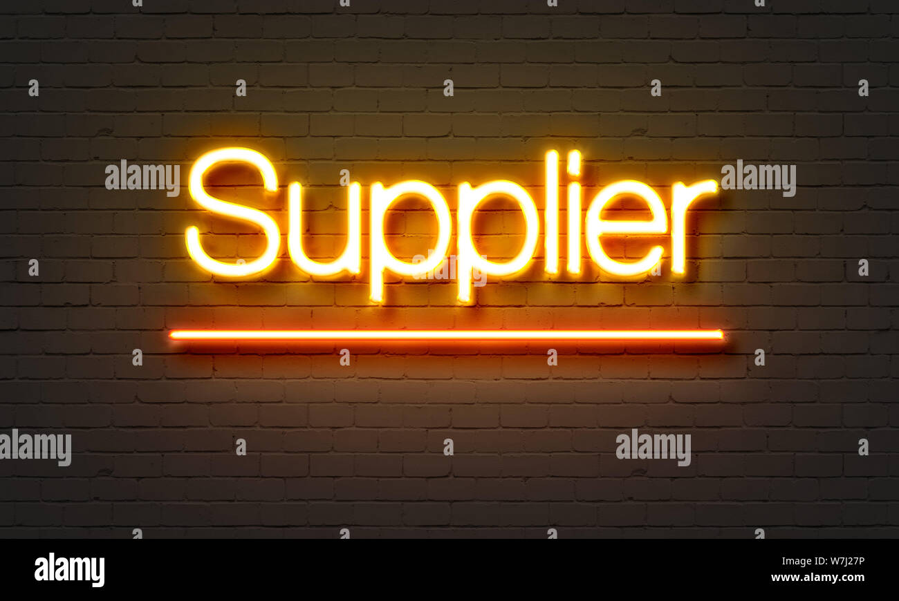 Supplier neon sign on brick wall background Stock Photo - Alamy