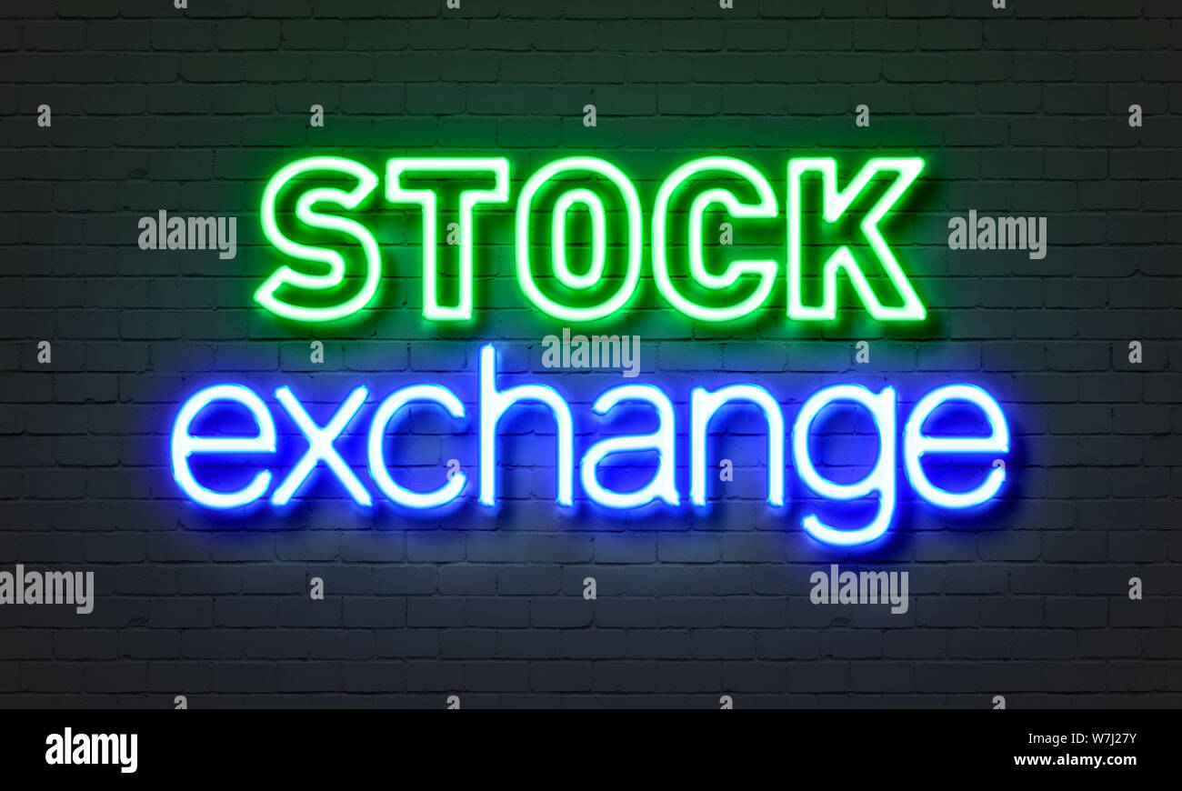 Stock exchange neon sign on brick wall background Stock Photo - Alamy