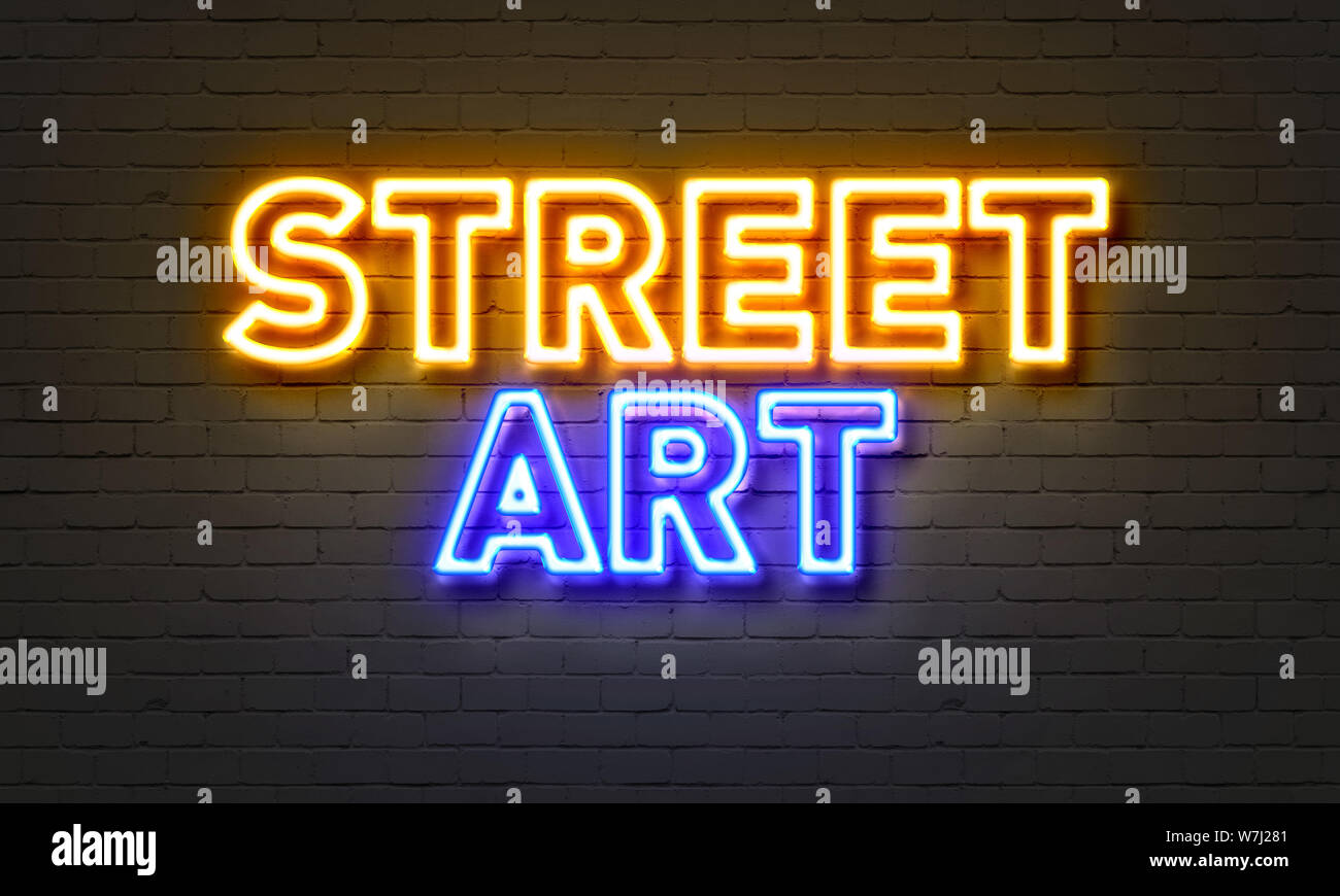 Street art neon sign on brick wall background Stock Photo - Alamy