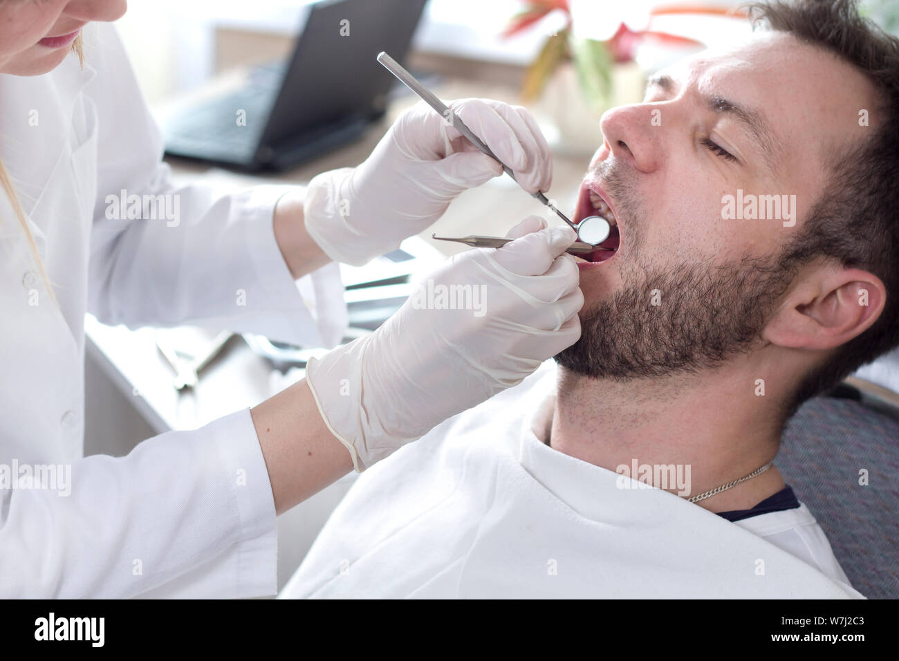 Pre-medical review of the condition of teeth in a middle-aged man. Wide ...