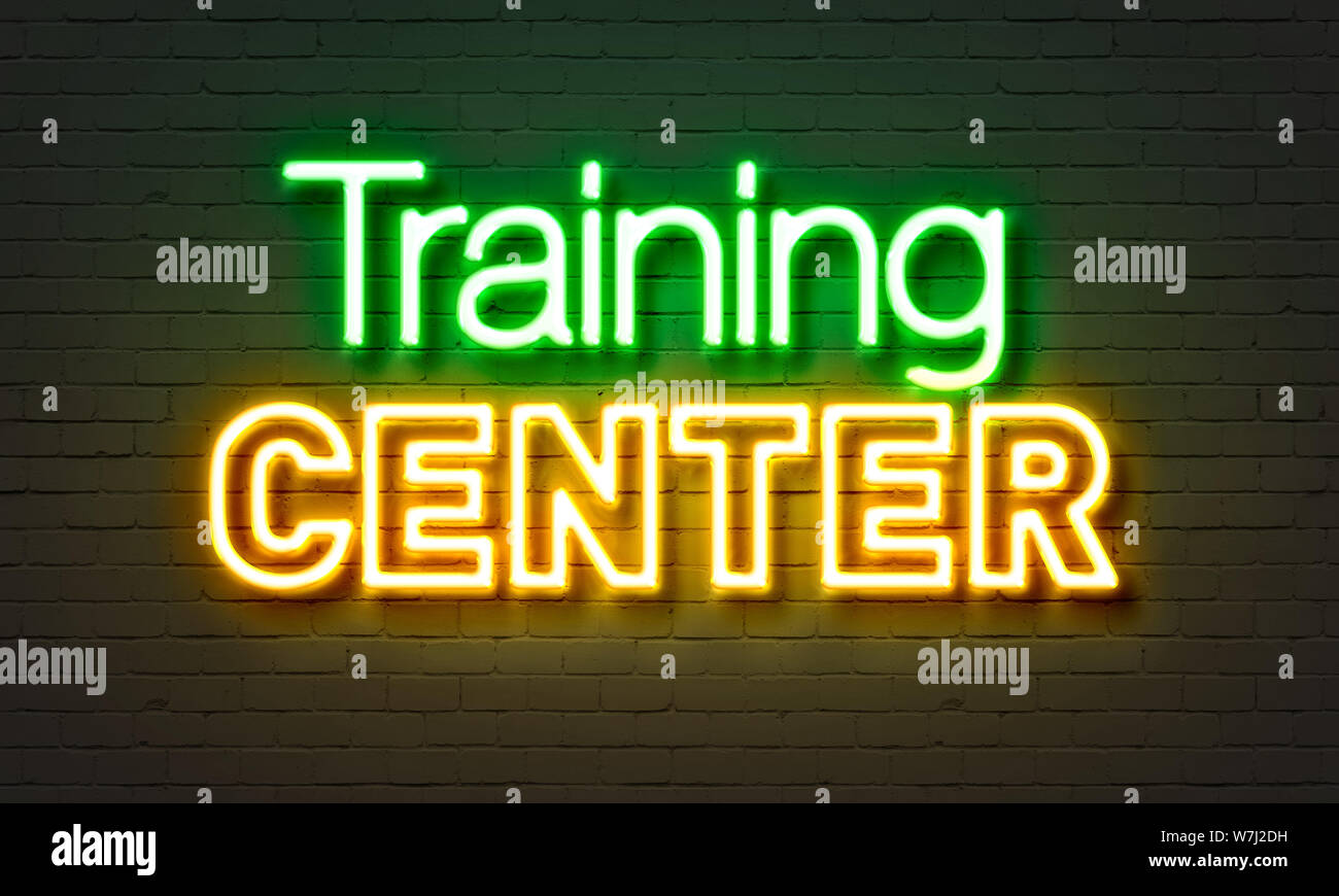Training center neon sign on brick wall background Stock Photo - Alamy