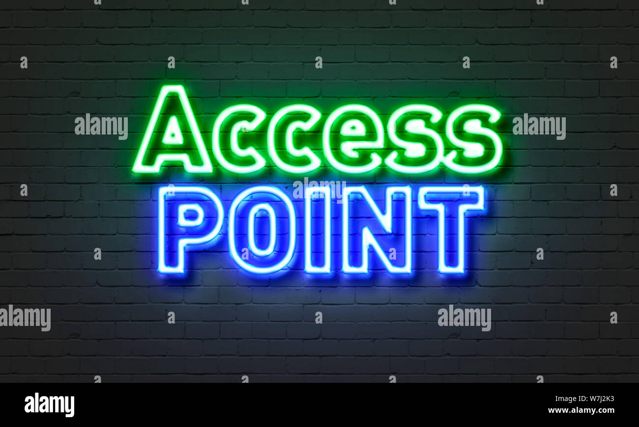 Access point neon sign on brick wall background Stock Photo - Alamy