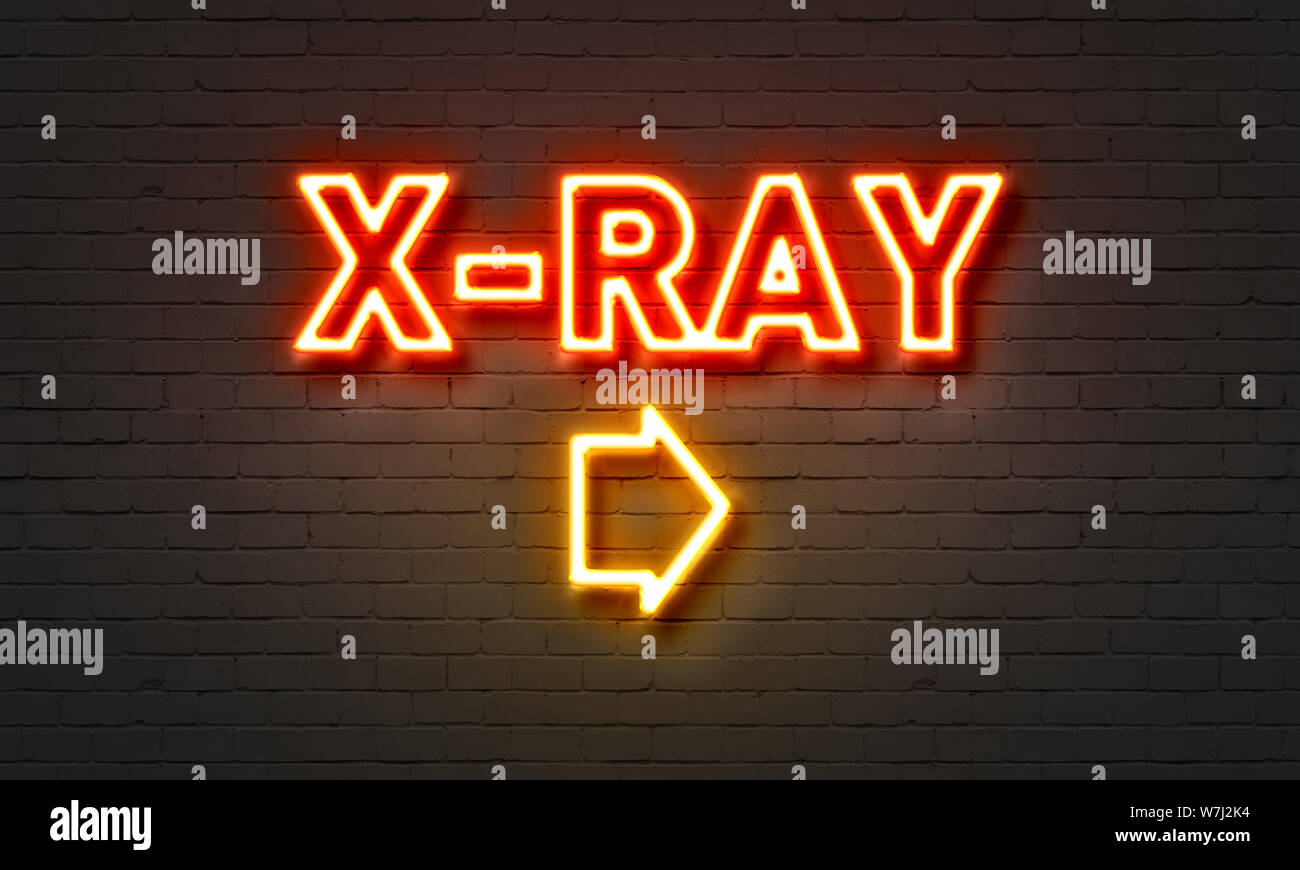 X-ray neon sign on brick wall background Stock Photo - Alamy
