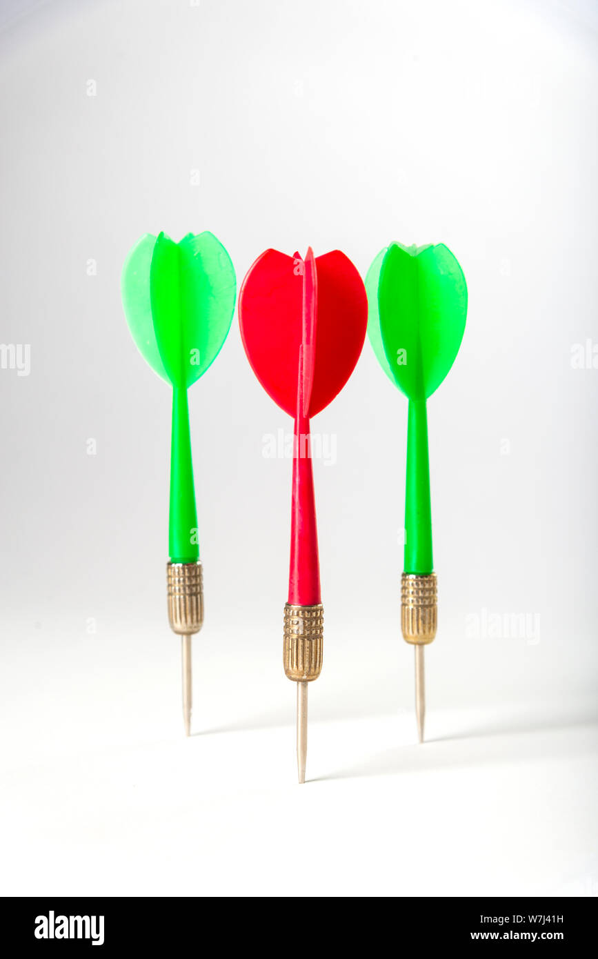 3 colored darts on a white background. Hit the target Stock Photo - Alamy
