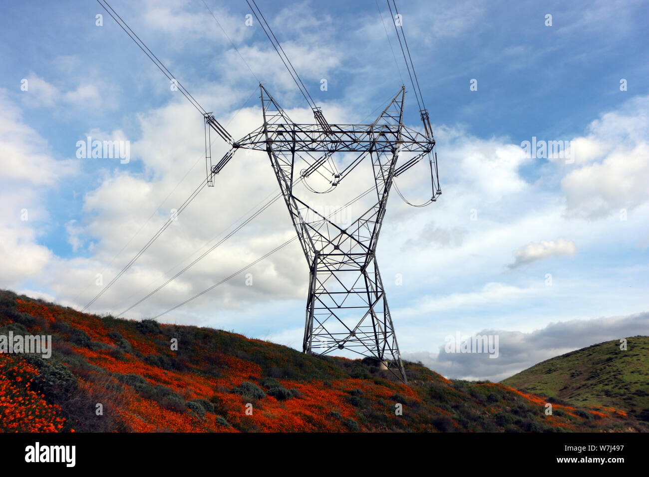 Power line tower on the mountain near the Lake Elsinore in California ...