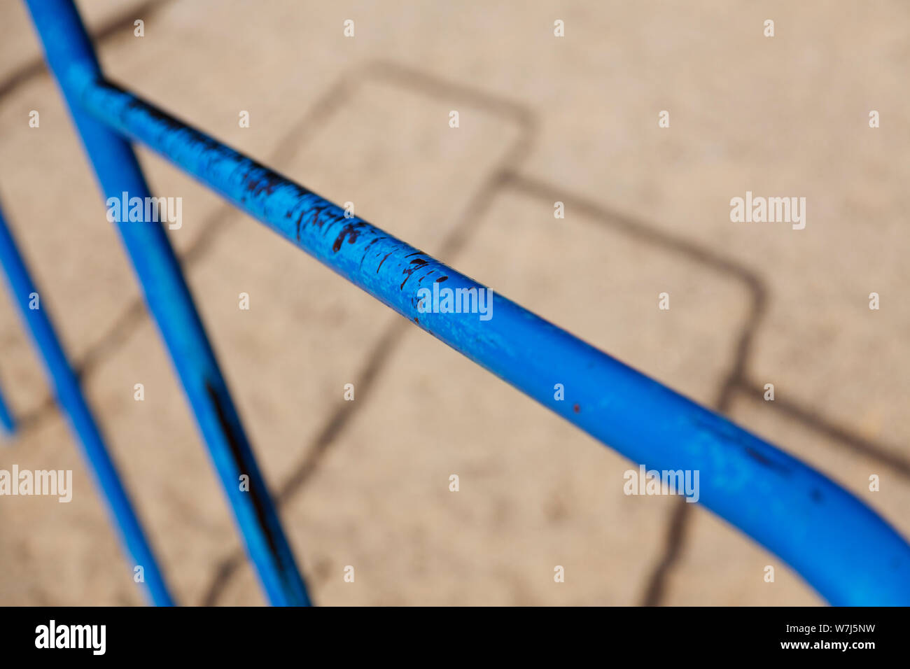 playground trapeze in close-up with shadow on the ground Stock Photo ...