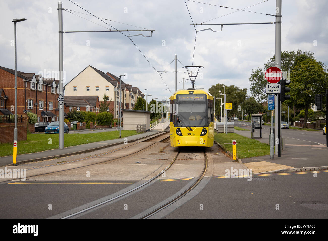 Metrolink Tram passing through Wythenshawe, Manchester Stock Photo - Alamy