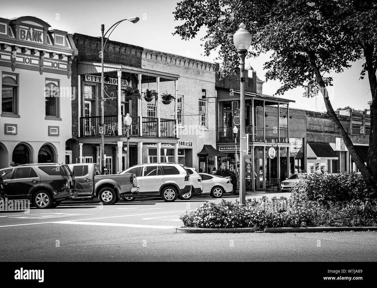 Small town square downtown brick buildings Black and White Stock Photos ...