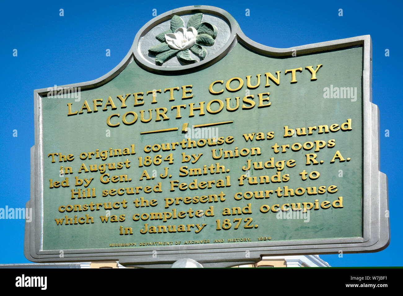 A historical marker for the Lafayette County Courthouse stands on the ...