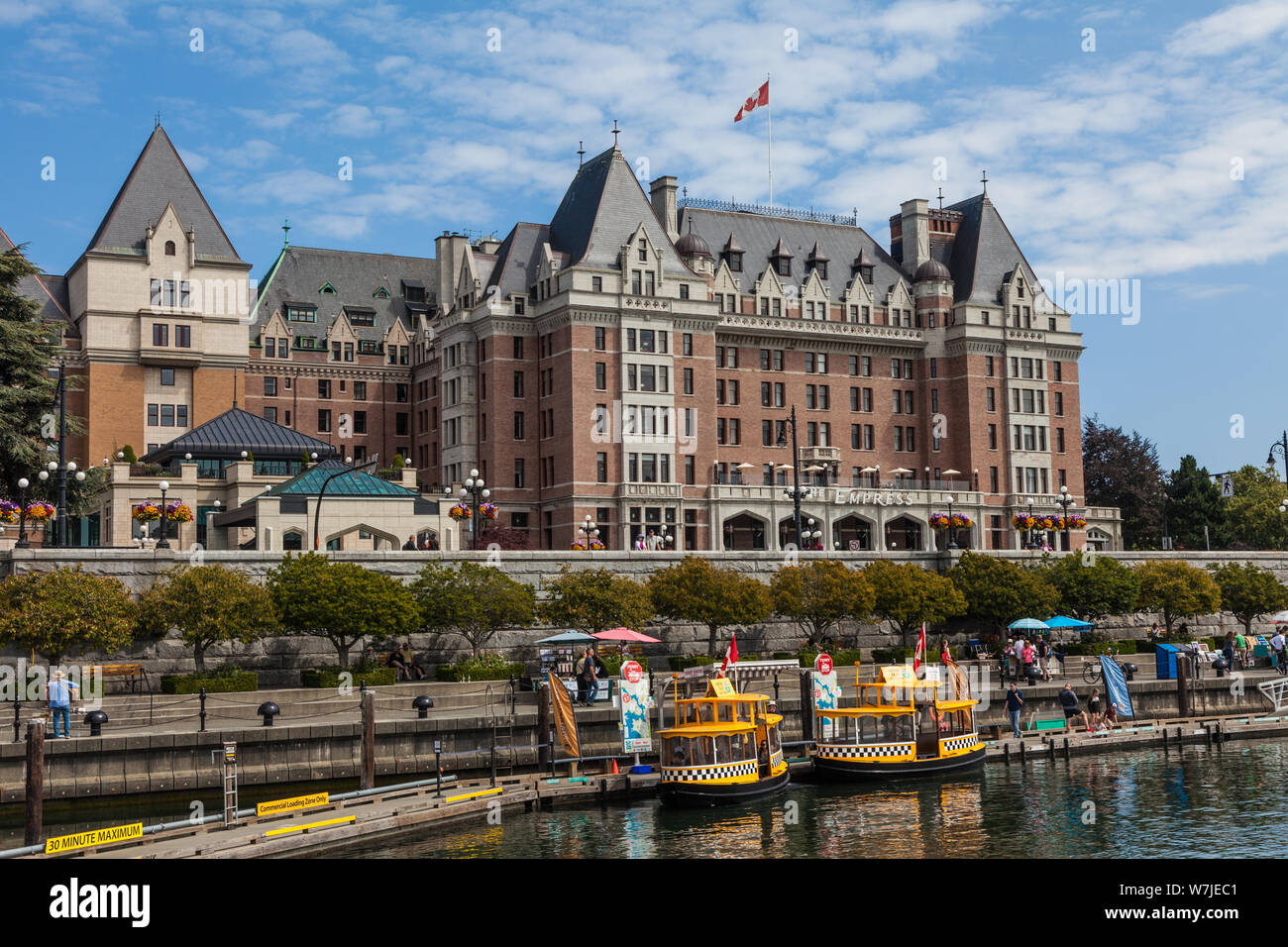 The iconic Empress Hotel by the Inner Harbour of Victoria in British ...