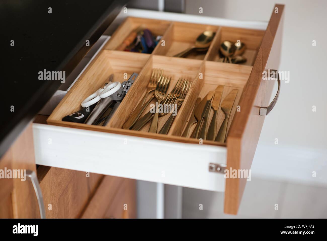 Types of silverware in a drawer Stock Photo - Alamy