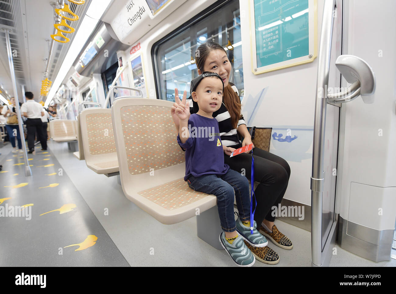 Passengers are pictured in a metro train on Metro Line 10 in Chengdu ...