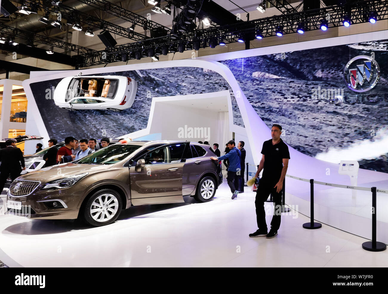 --FILE--People visit the stand of Buick of SAIC-GM, a joint venture ...