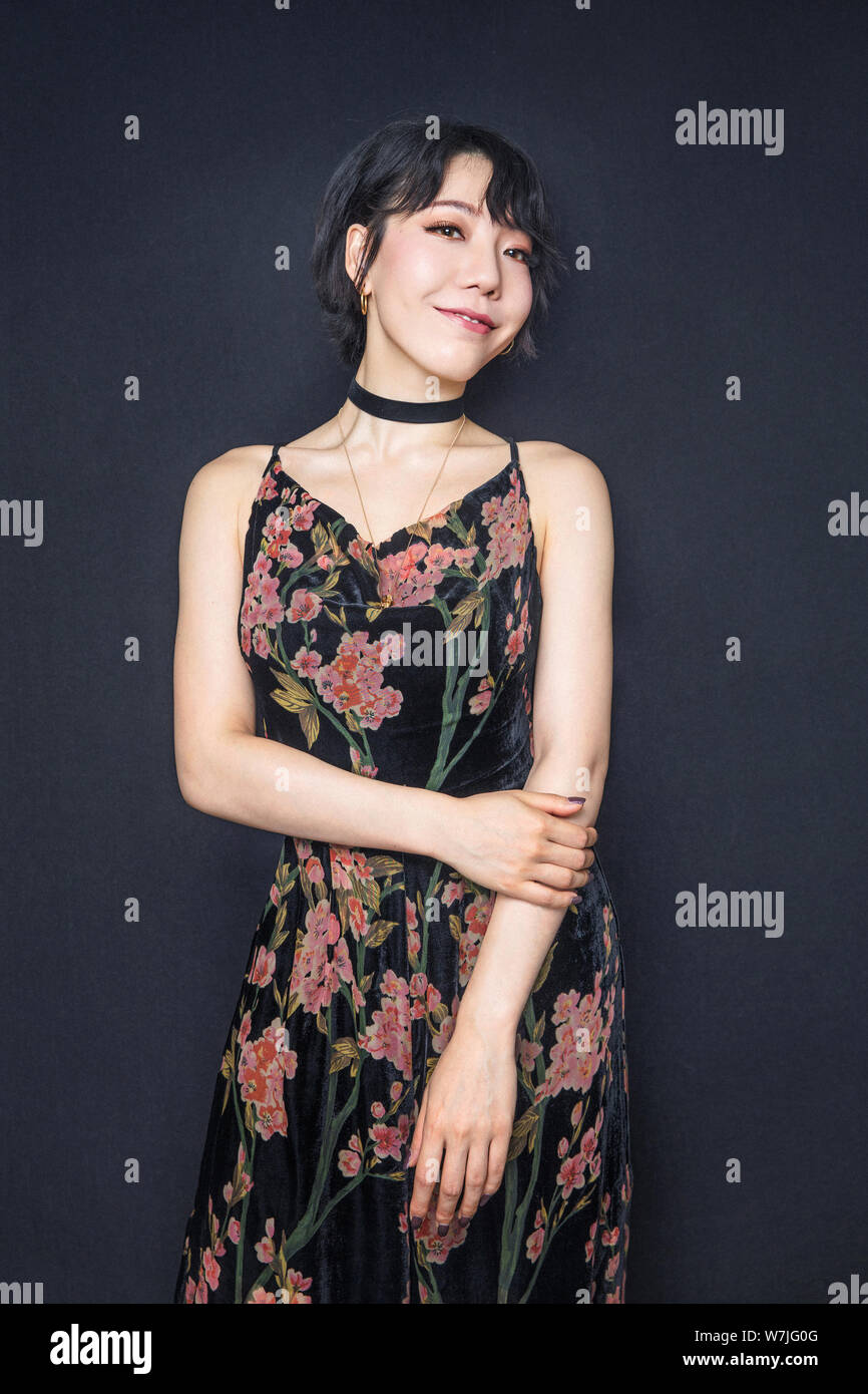 Chinese singer Wu Mochou, also known by her English name Momo Wu, poses ...