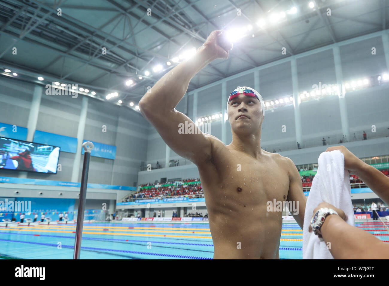 Chinese swimming star Sun Yang of Zhejiang celebrates after winning the ...