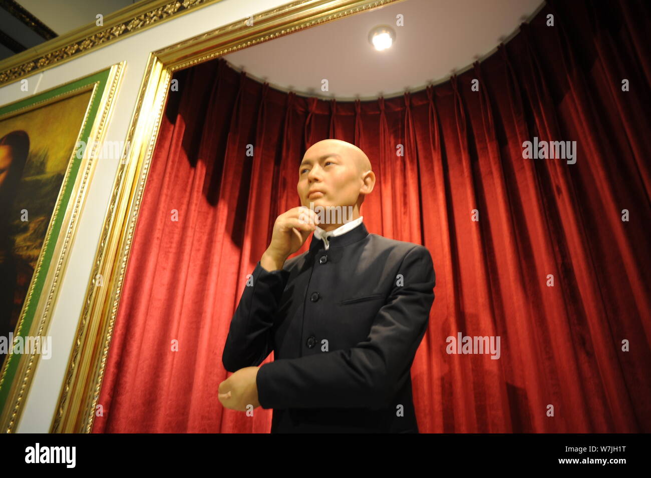 A wax figure of Chinese actor Ge You is on display in a replica of the ...