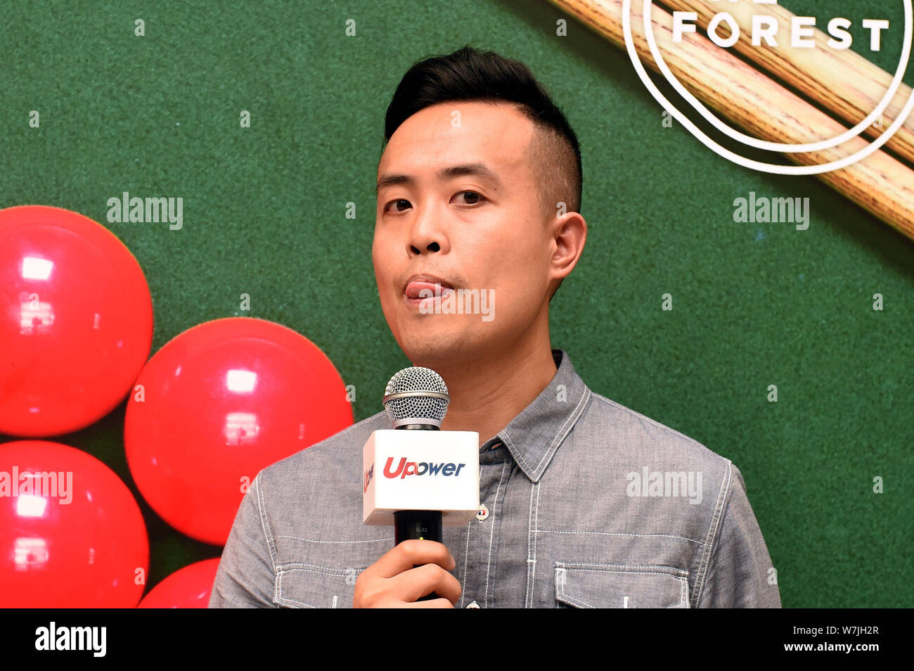 Hong Kong snooker player Marco Fu attends a signing event for his ...