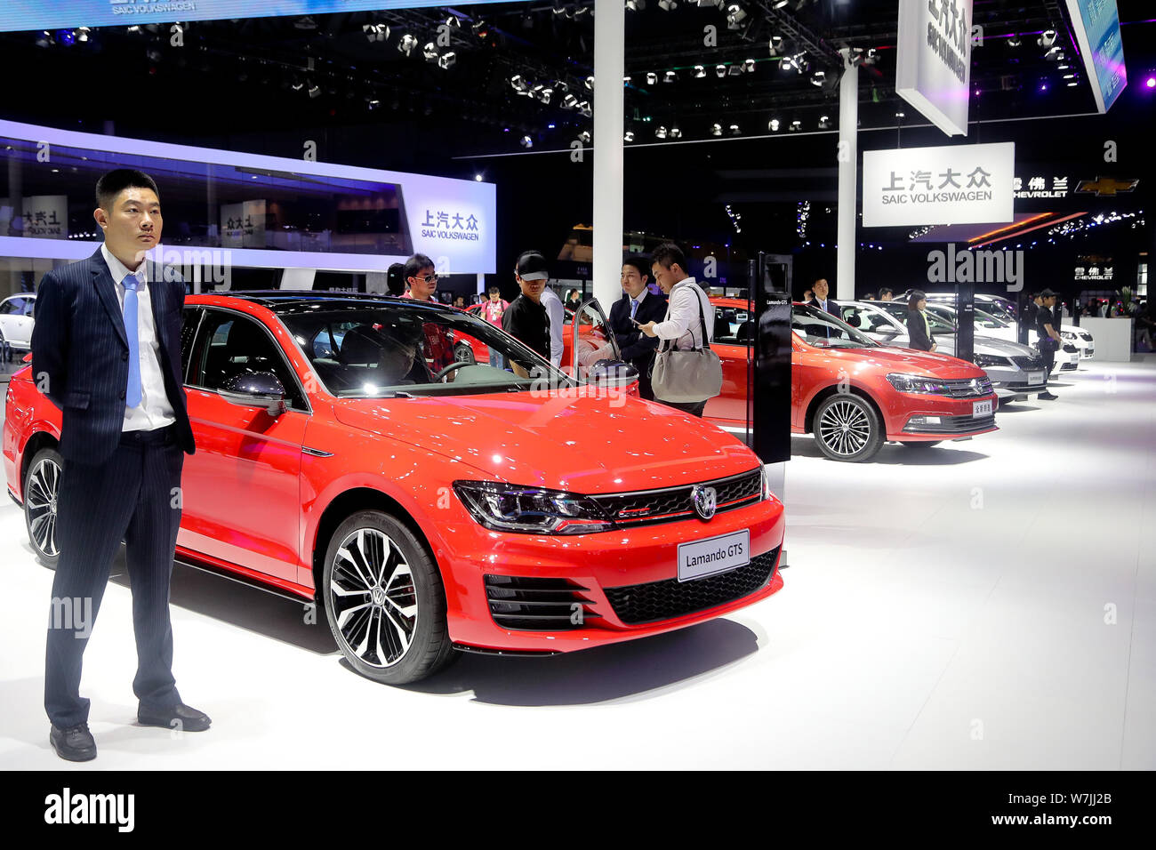 --FILE--Cars on display at the stand of SAIC Volkswagen, a joint ...