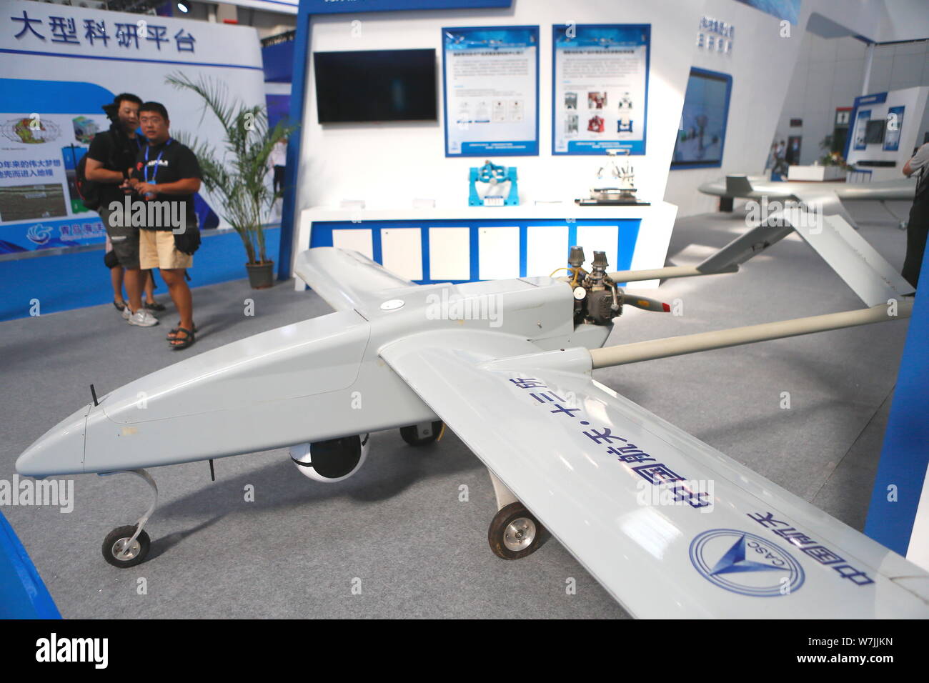 --FILE--Visitors look at a drone made by CASC (China Aerospace Science ...