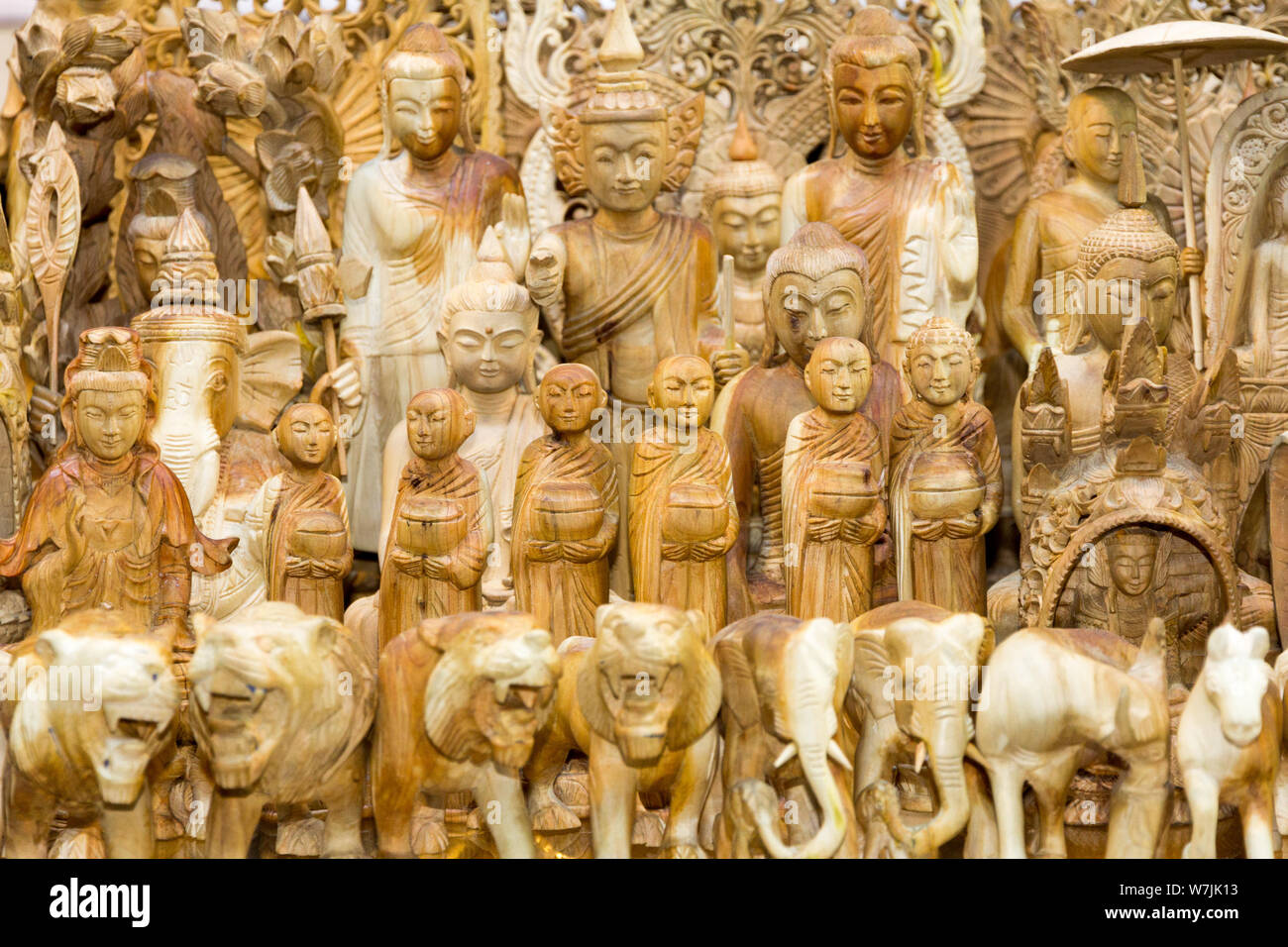 Wooden statues on a market stall in Yangon, Myanmar Stock Photo - Alamy