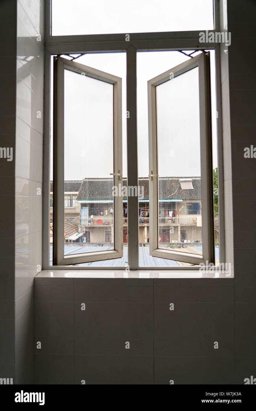 View out a Chinese factory window near Shanghai, China Stock Photo - Alamy