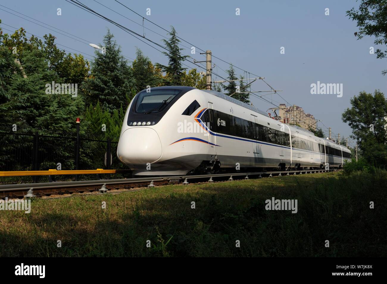 --FILE--A CRH6 intercity train with the four-car configuration is pictured in Qingdao city, east ...