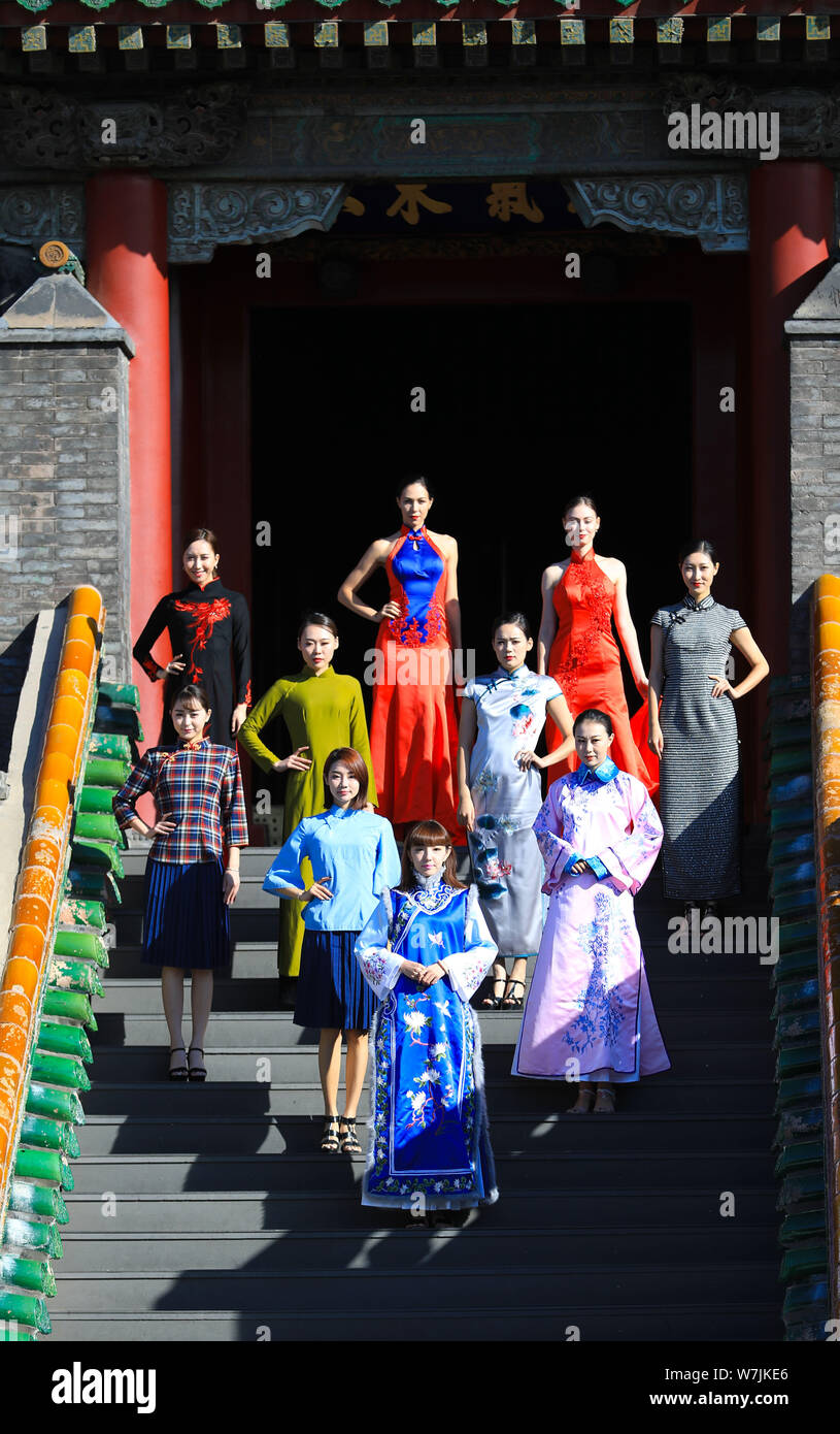 Models display cheongsam, also known as qipao in Chinese, during the ...