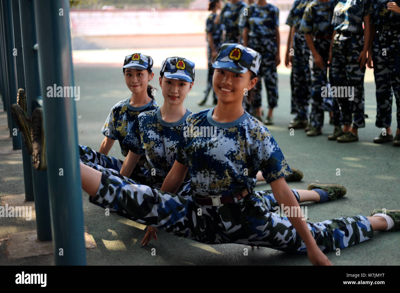 Chinese freshmen students majoring in dancing perform during a break in ...