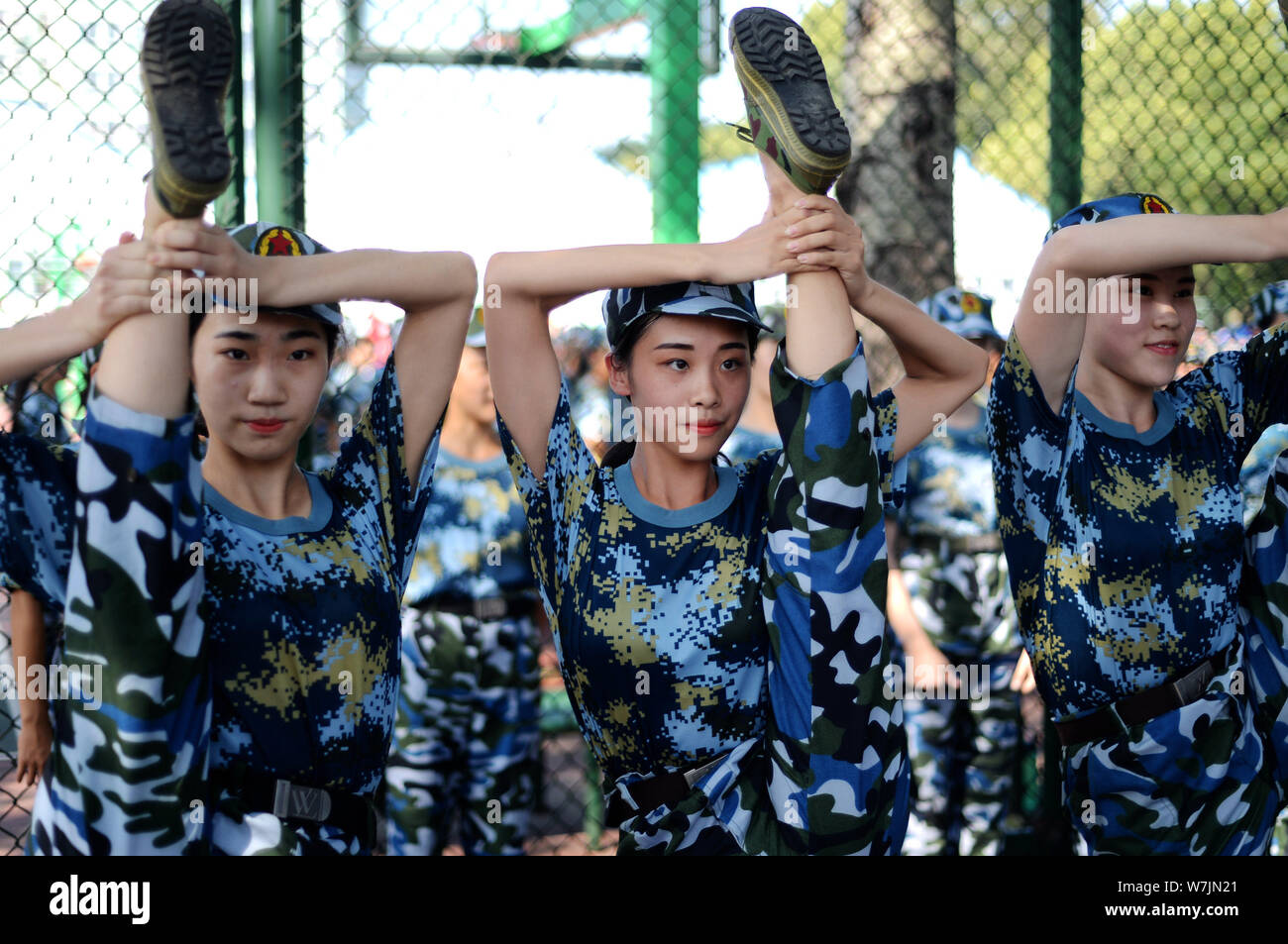 Chinese freshmen students majoring in dancing perform during a break in ...