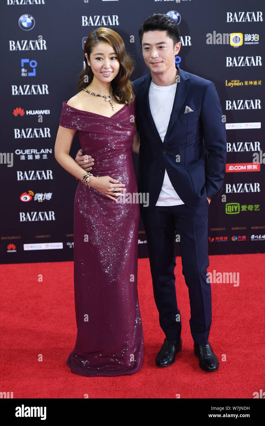 Taiwanese actress Ruby Lin, left, and her husband actor Wallace Huo ...