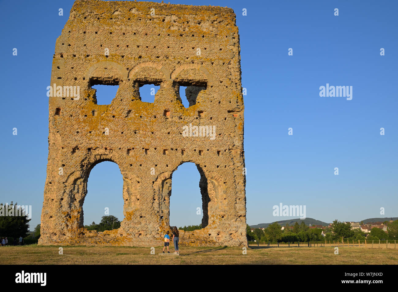 Two children looking at the Janus temple at sunset, Autun FR Stock ...