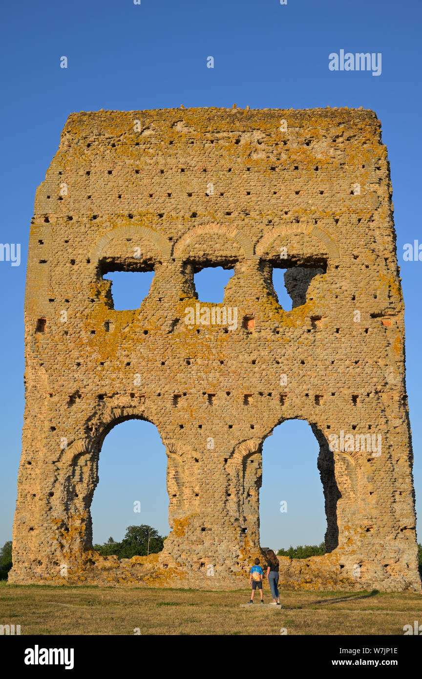 Two children looking at the Janus temple at sunset, Autun FR Stock ...
