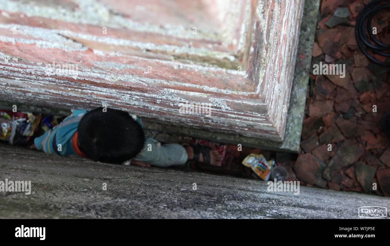 The head of a nine-year-old Chinese boy surnamed Huang gets stuck in a ...