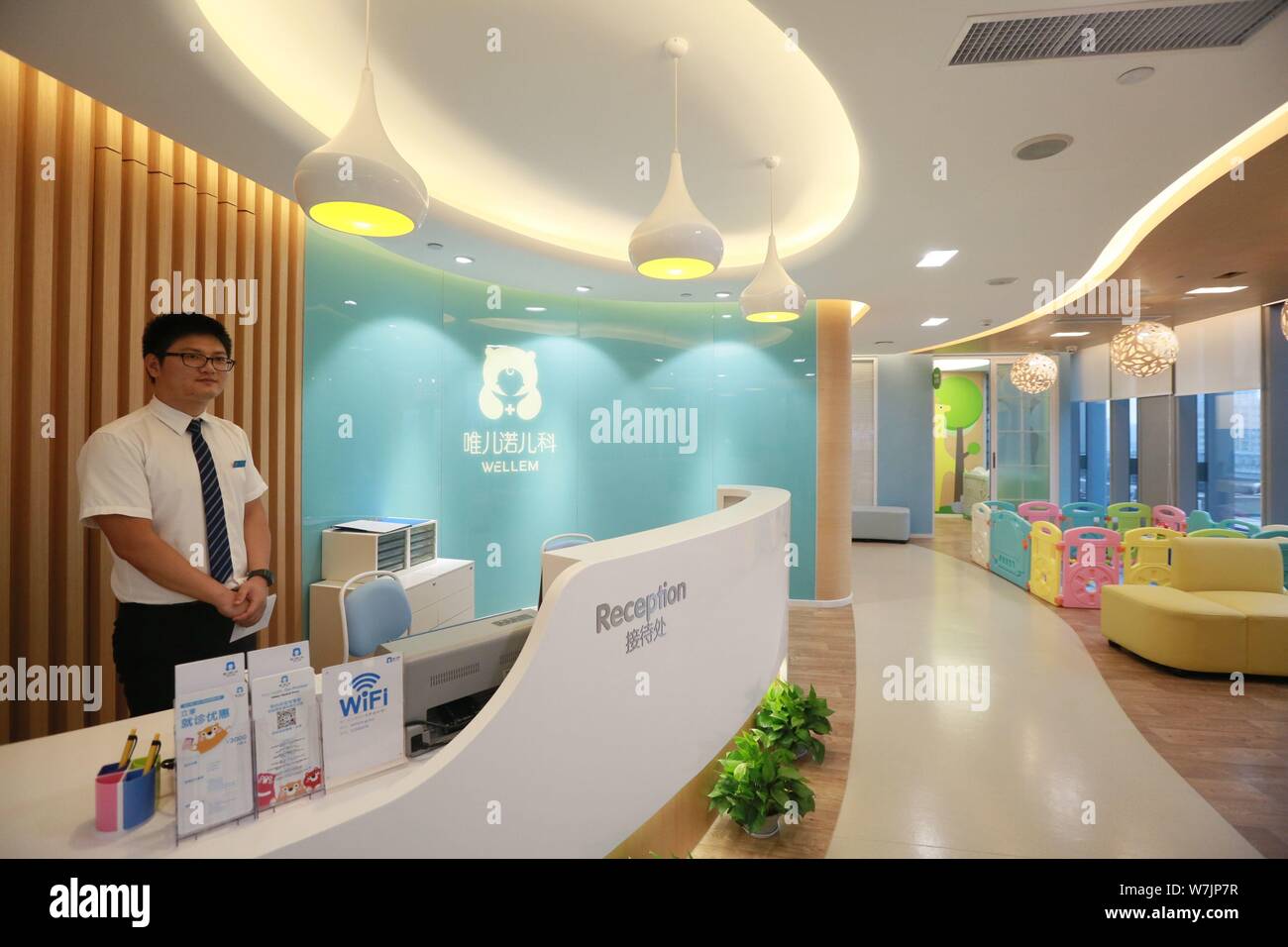 An employee is pictured at the Quancheng International Medical Center ...