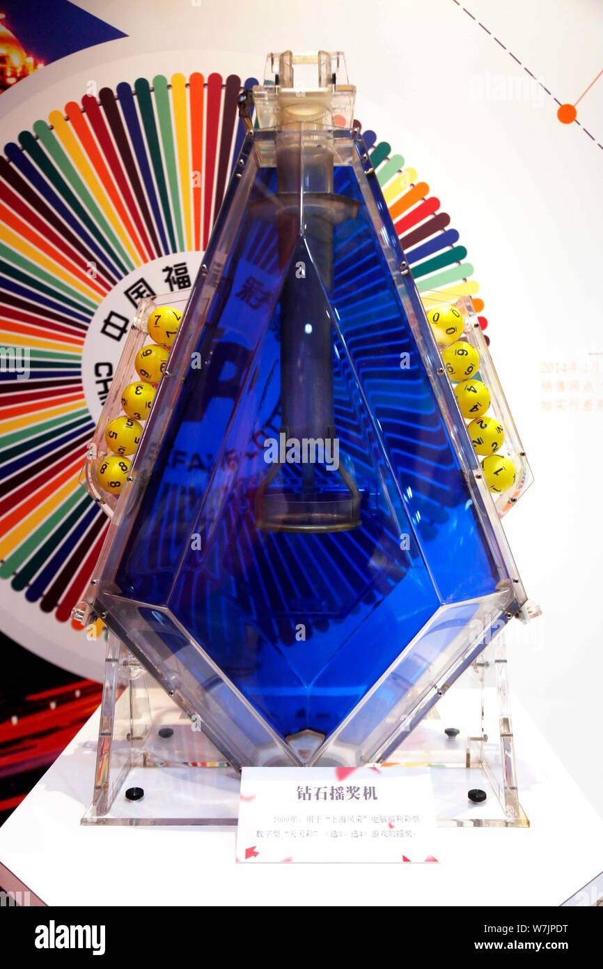 A lottery machine is on display at the Shanghai Welfare Lottery Culture ...