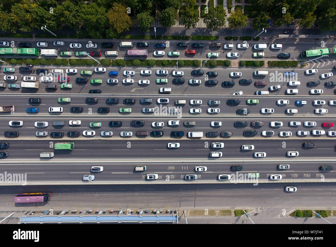 Aerial view of masses of vehicles on an elevated highway during a ...