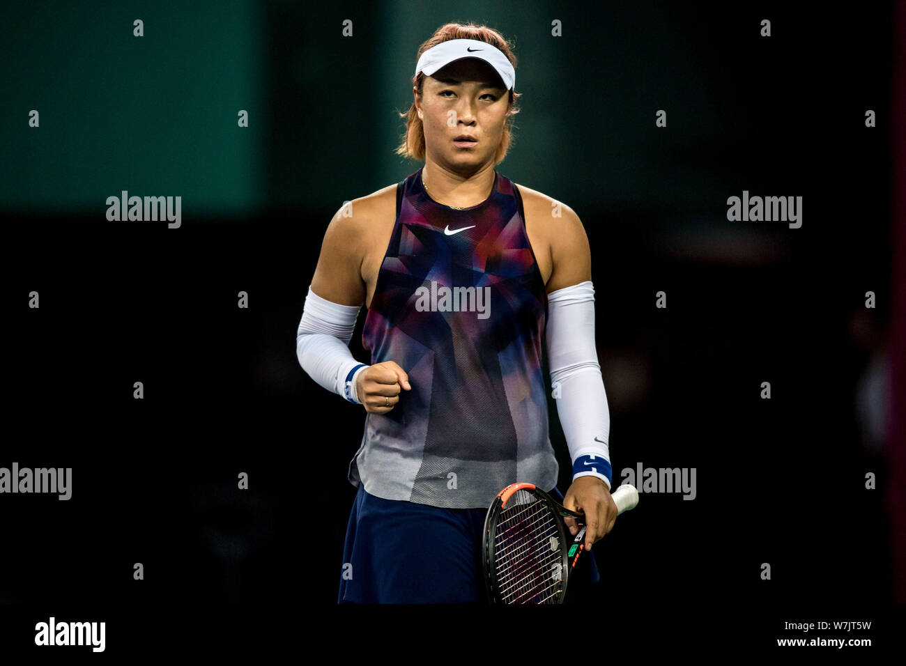 Han Xinyun of China reacts after scoring a goal against Samantha Stosur ...