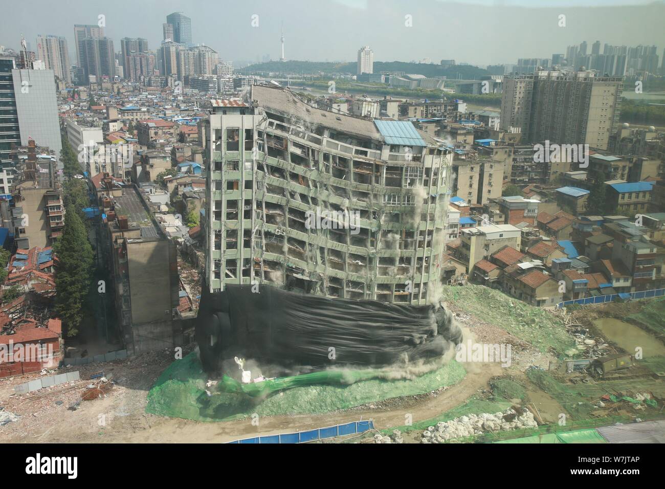 Heavy smoke rises after an old residential building exploded during a ...