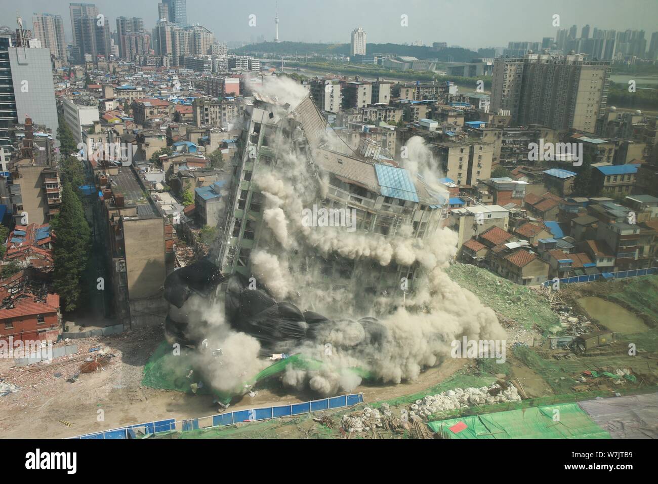Heavy smoke rises after an old residential building exploded during a ...