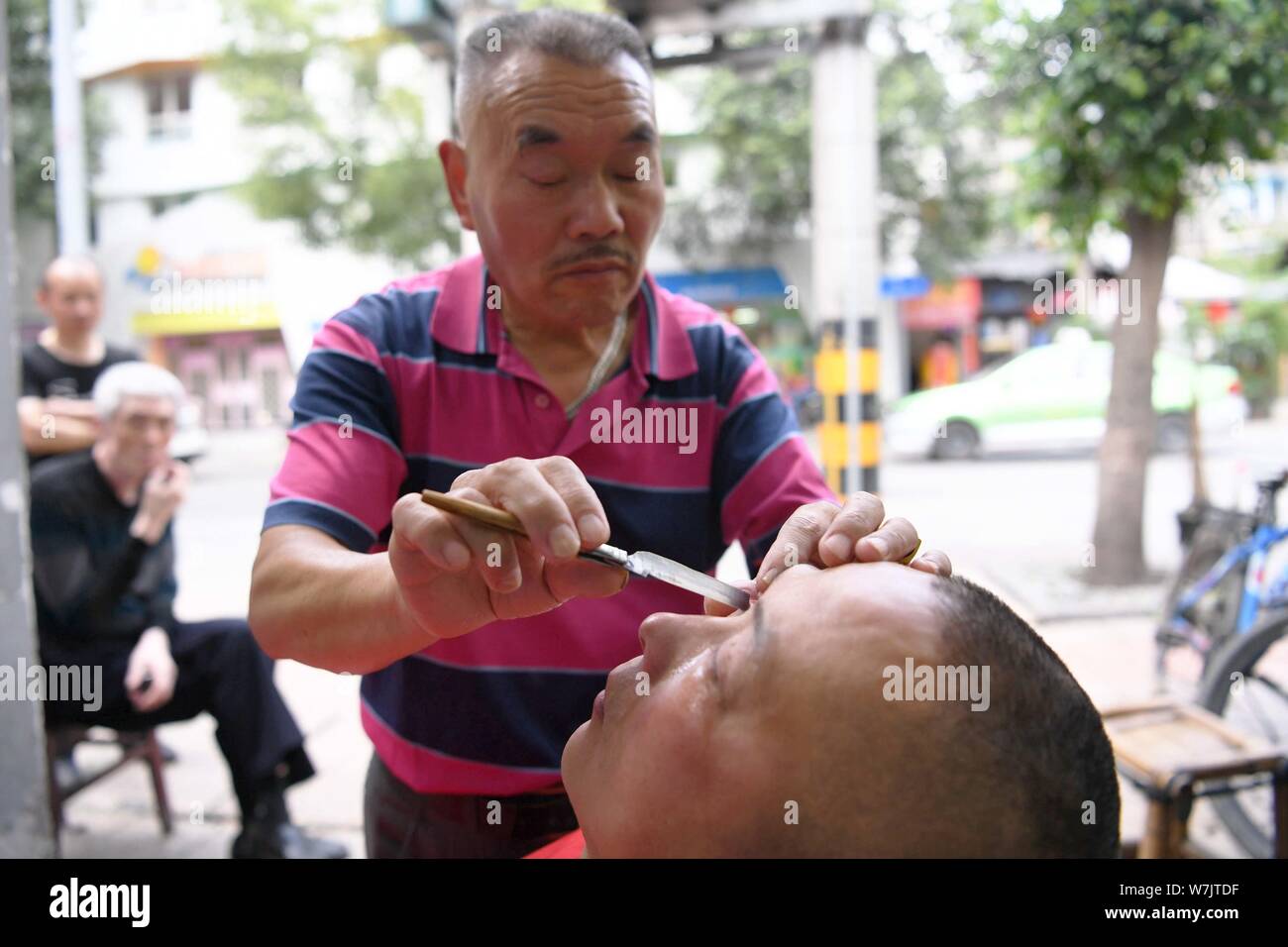 Chinese haircut hi-res stock photography and images - Alamy