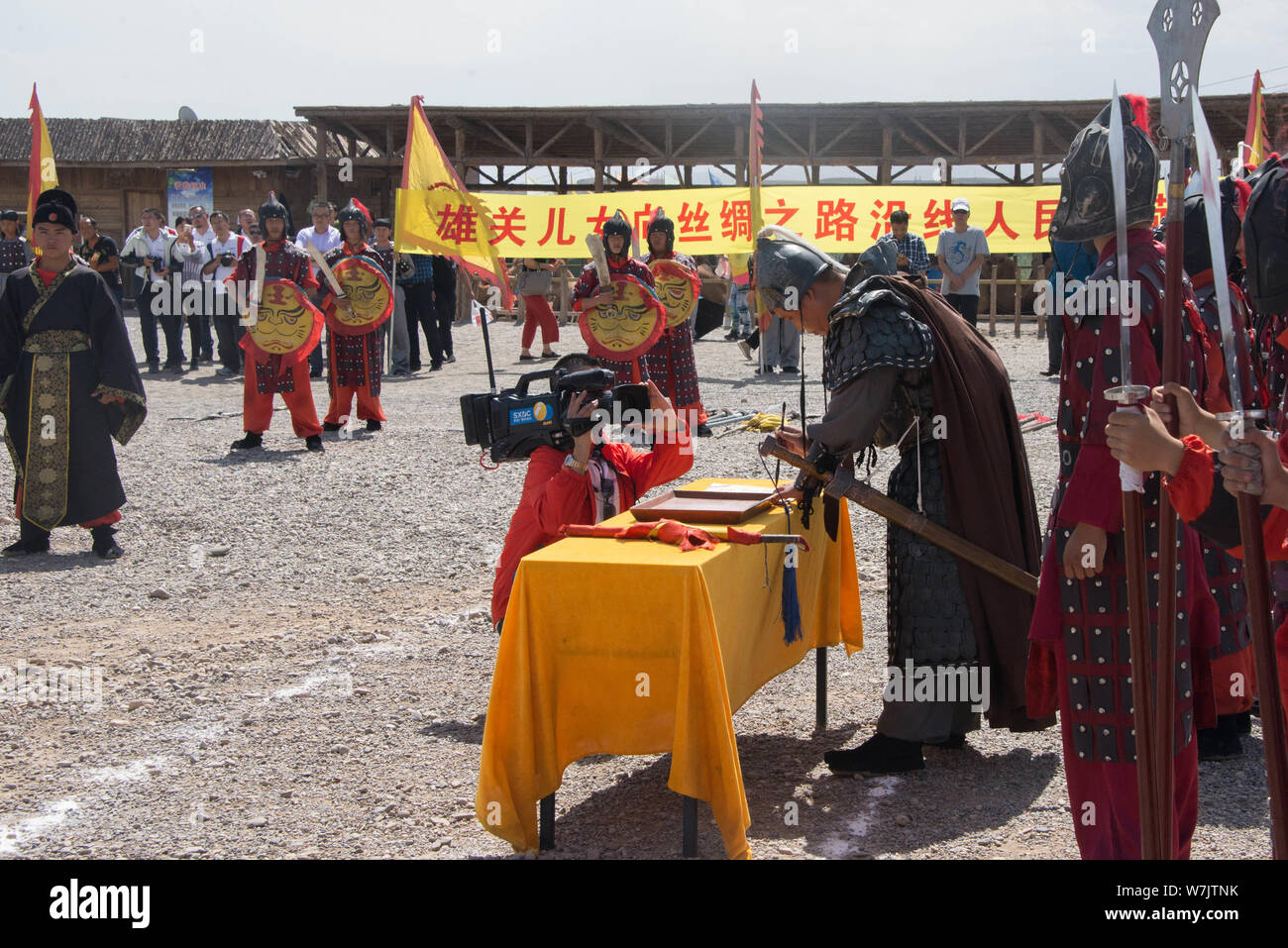 Chinese artists dressed in traditional costumes are seen during an ...